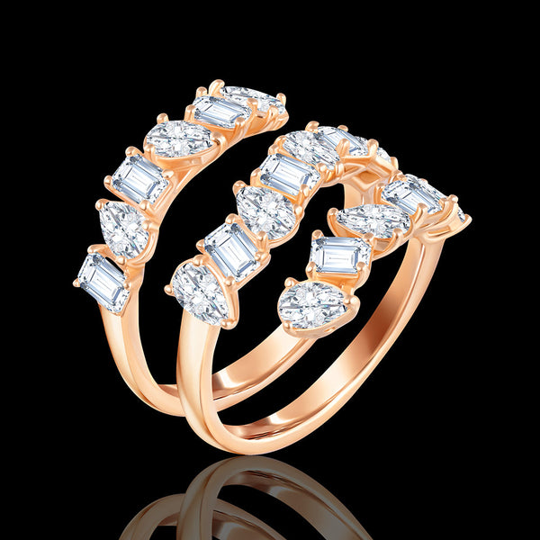 ACASO ring featuring stunning emerald and pear-shaped stones Acaso col ...